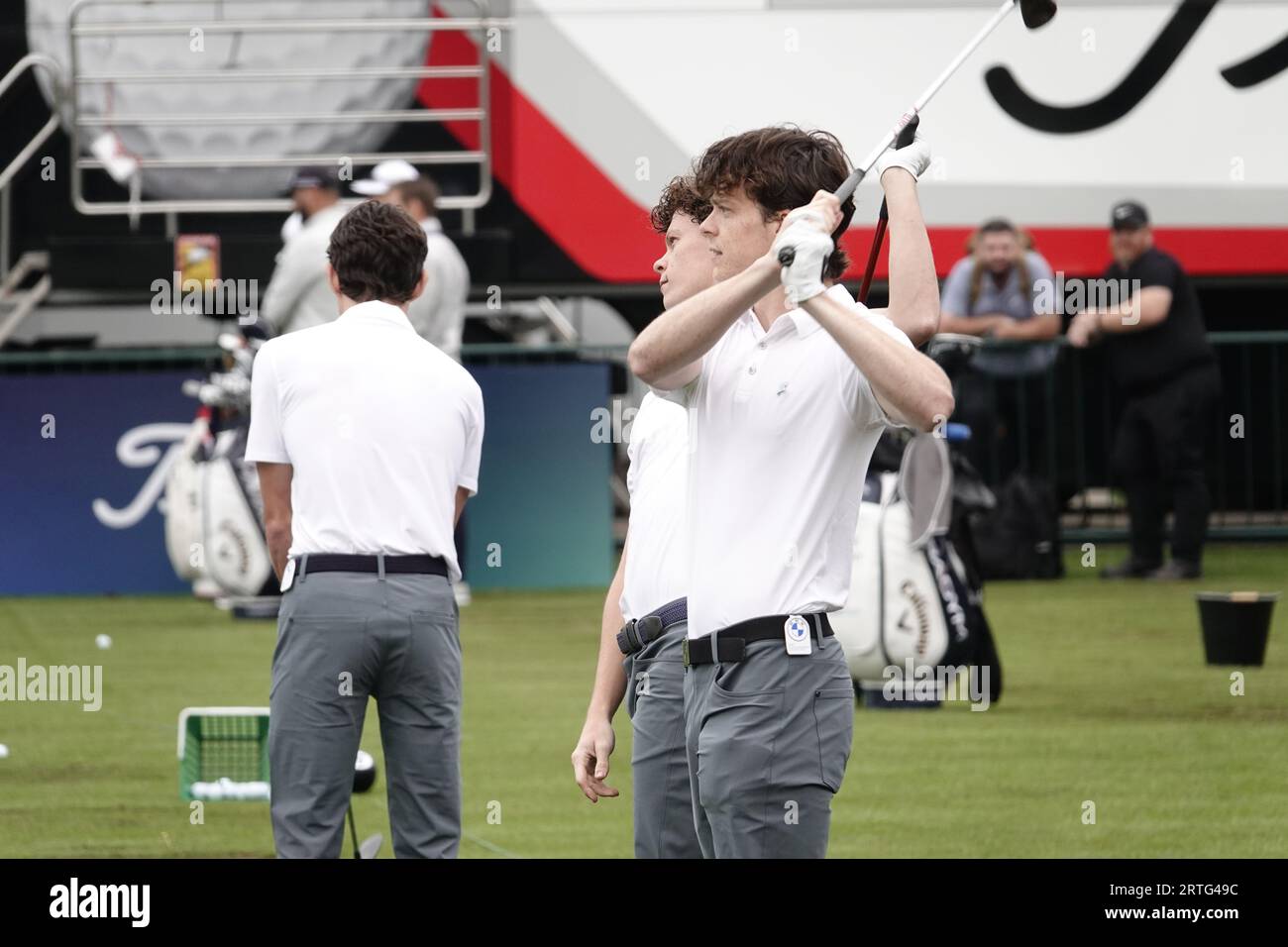 Wentworth, Surrey, UK. 13th Sep, 2023. Actor Tom Holland and his brothers (Harry, Sam) warm up ...