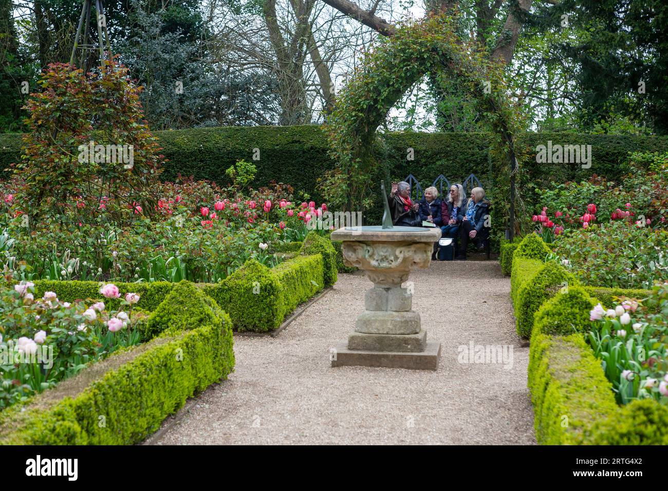 Ladies relaxing with glasses of bubbly in the the Rose Garden, Arundel ...