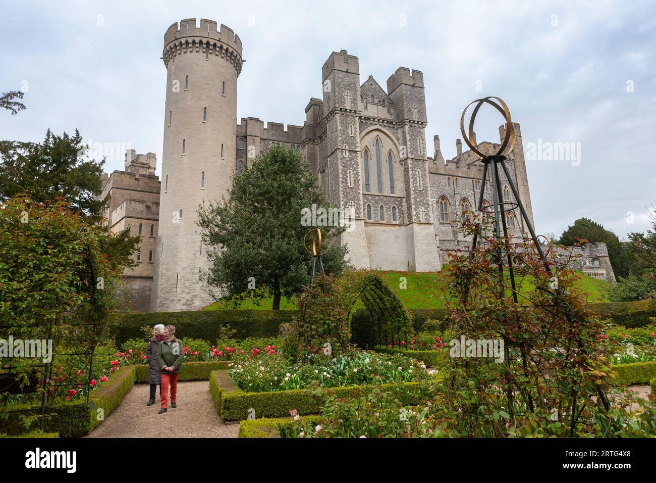 Two ladies enjoying the display of tulips in the Rose Garden, Arundel ...
