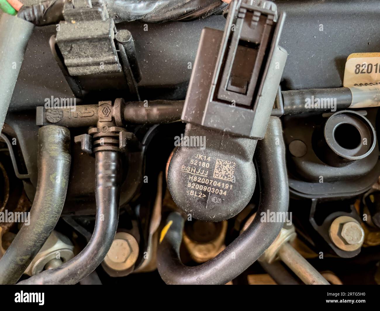 Milan, Italy 27 june 2023: Close-up view of a gasoline engine fuel ...
