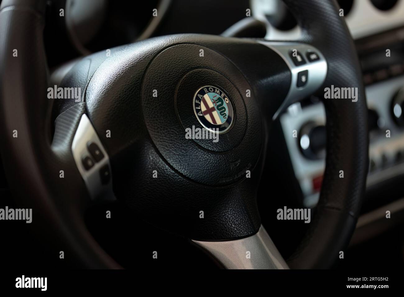 Milan, Italy 19 august 2023: Close-up of a classic Alfa Romeo steering ...