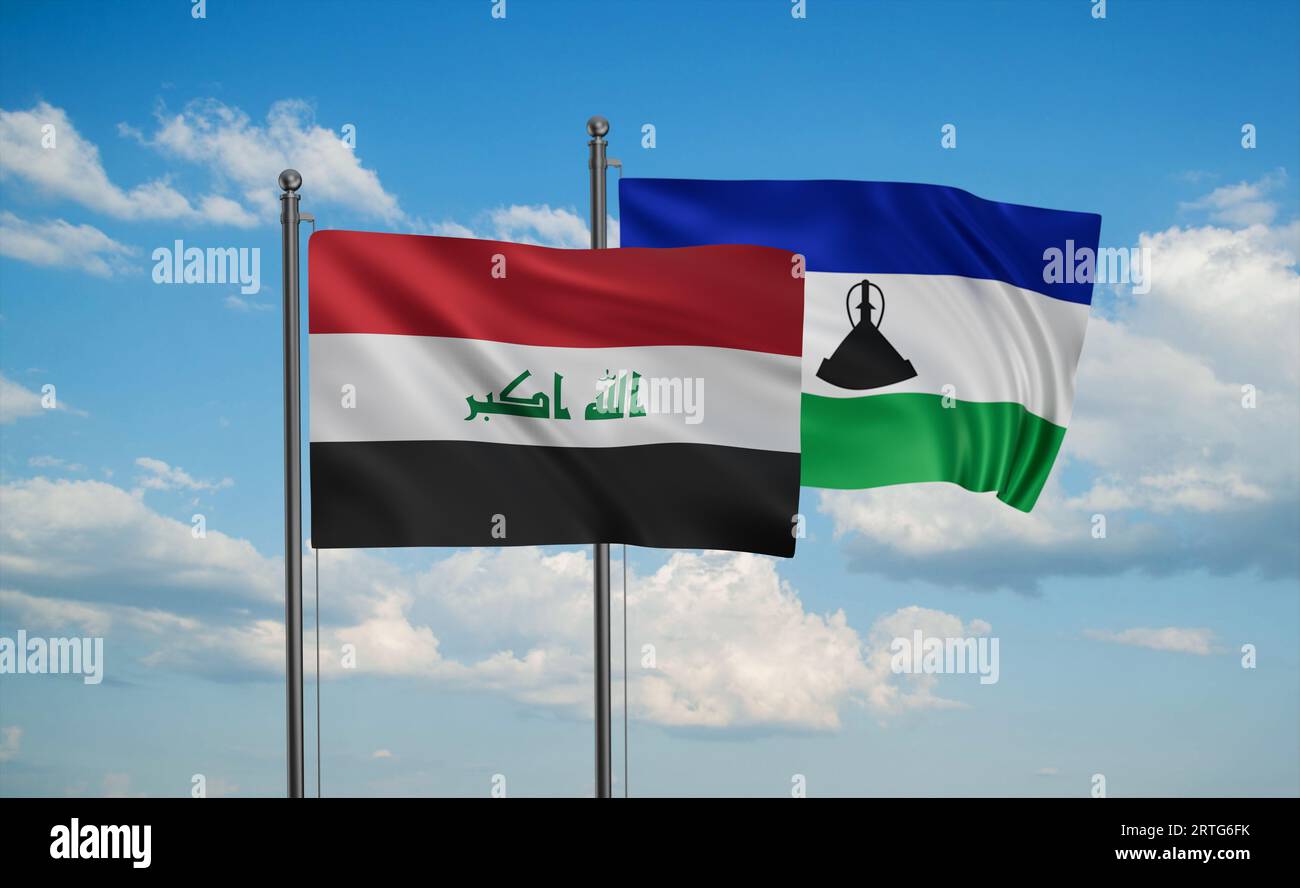 Lesotho and Iraq flag waving together in the wind on blue sky, two ...