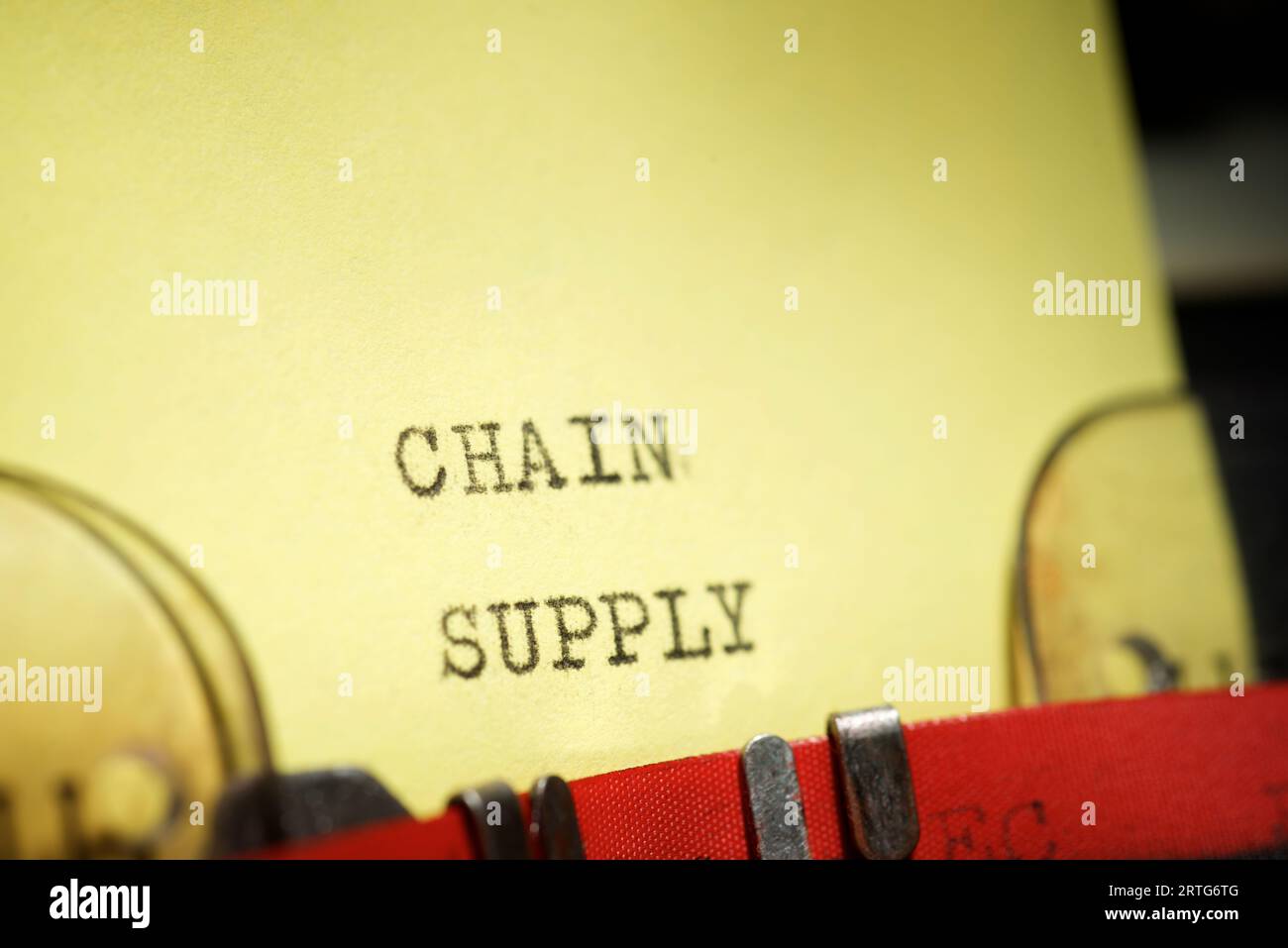 Chain supply text written with a typewriter Stock Photo - Alamy