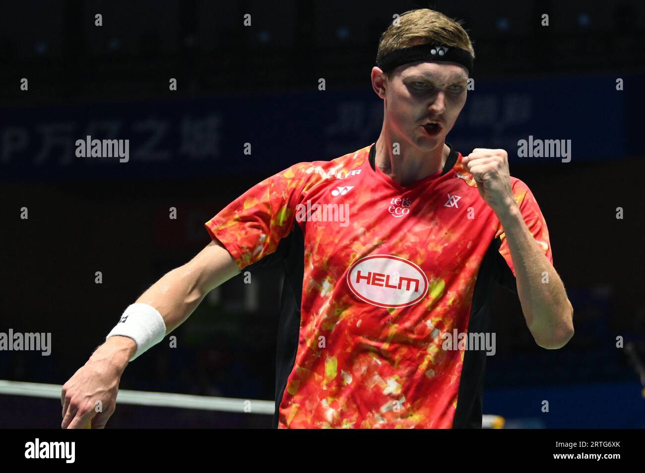 Danish badminton player Viktor Axelsen defeats Chinese badminton player ...