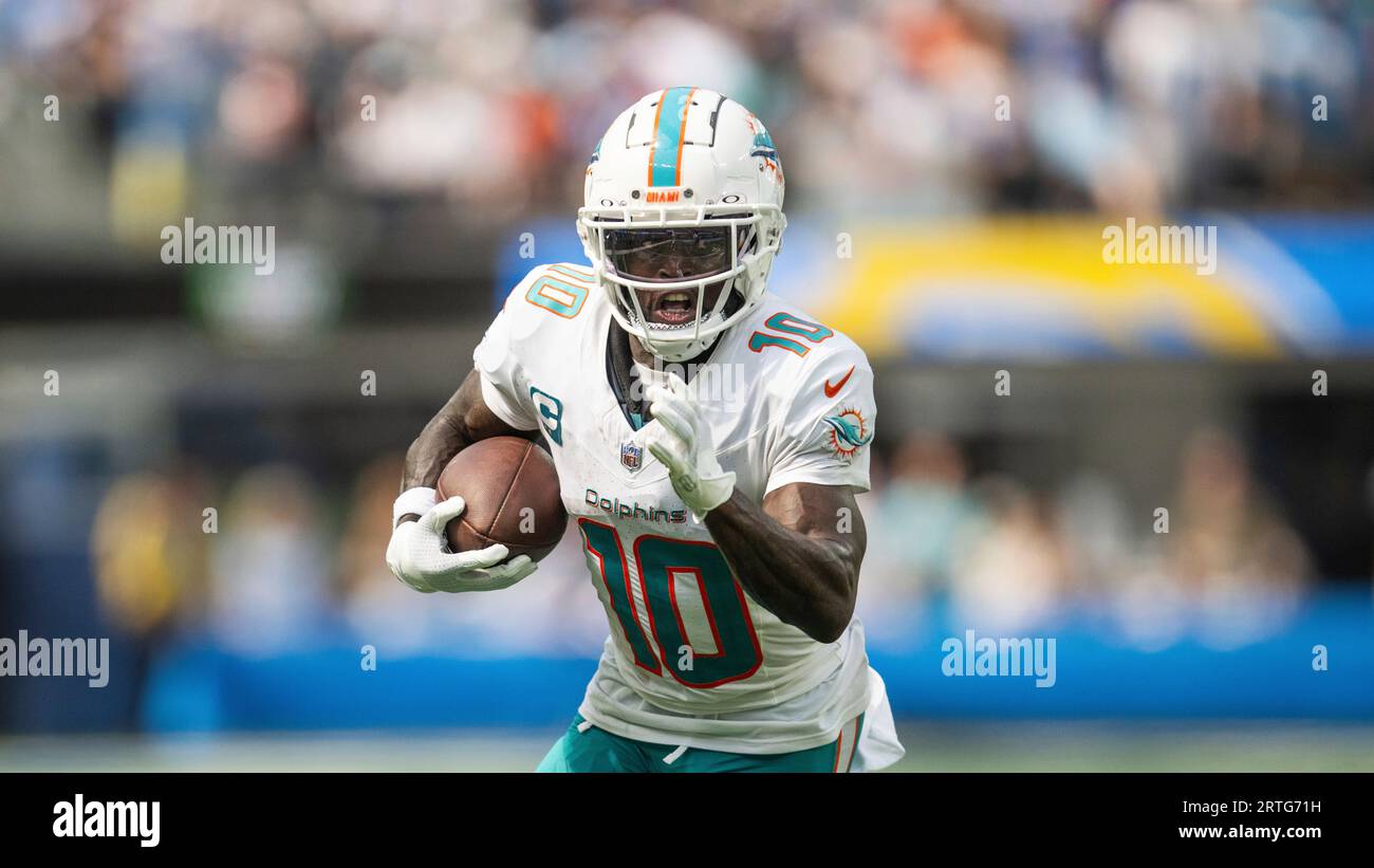 Miami Dolphins wide receiver Tyreek Hill (10) runs with the ball during ...