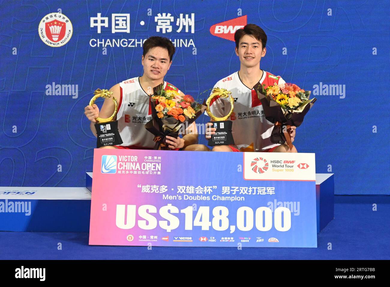 Chinese badminton players Liang Weikeng, Wang Chang defeat Malaysian badminton players Aaron ...