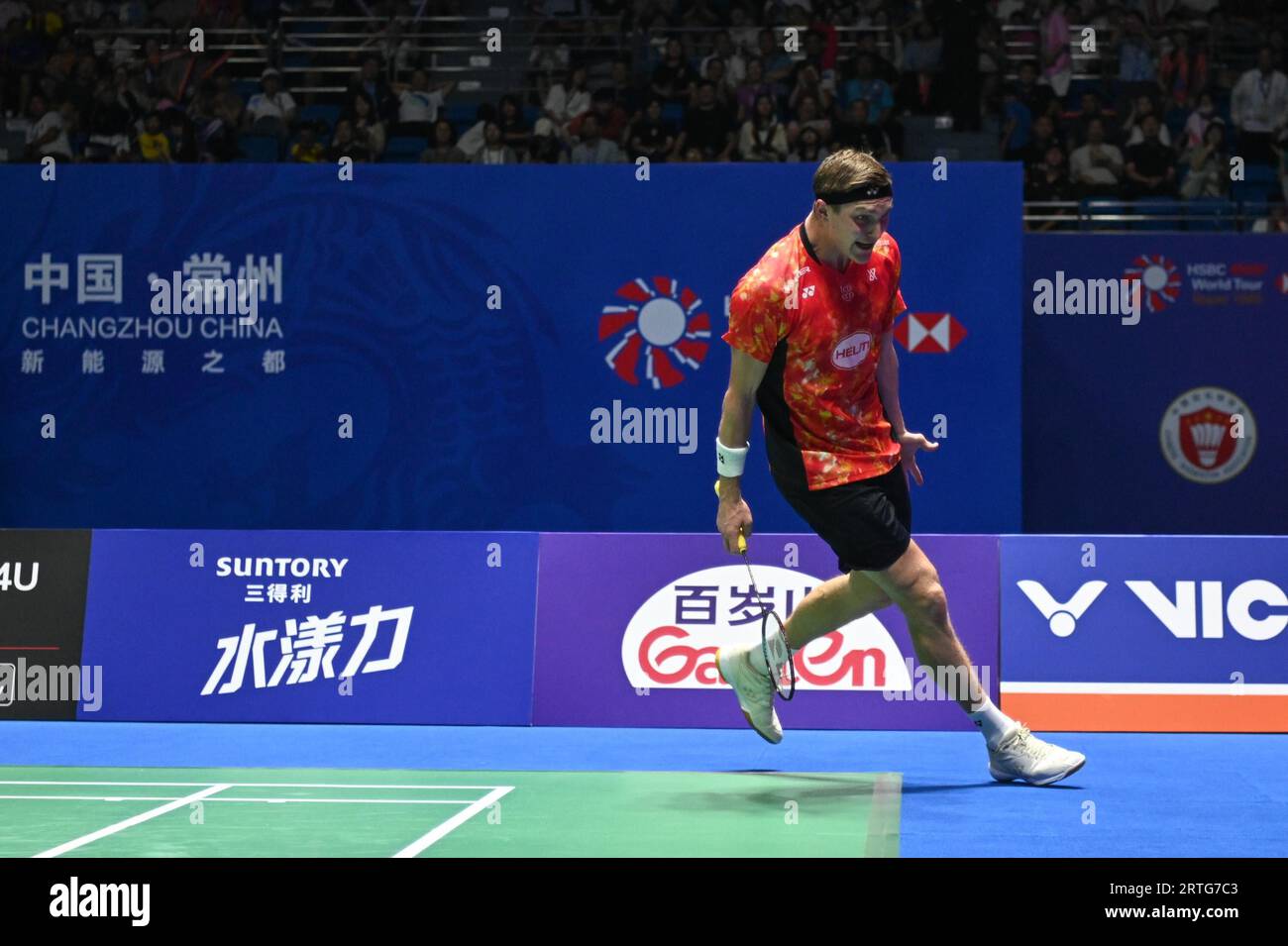 Danish badminton player Viktor Axelsen defeats Chinese badminton player ...