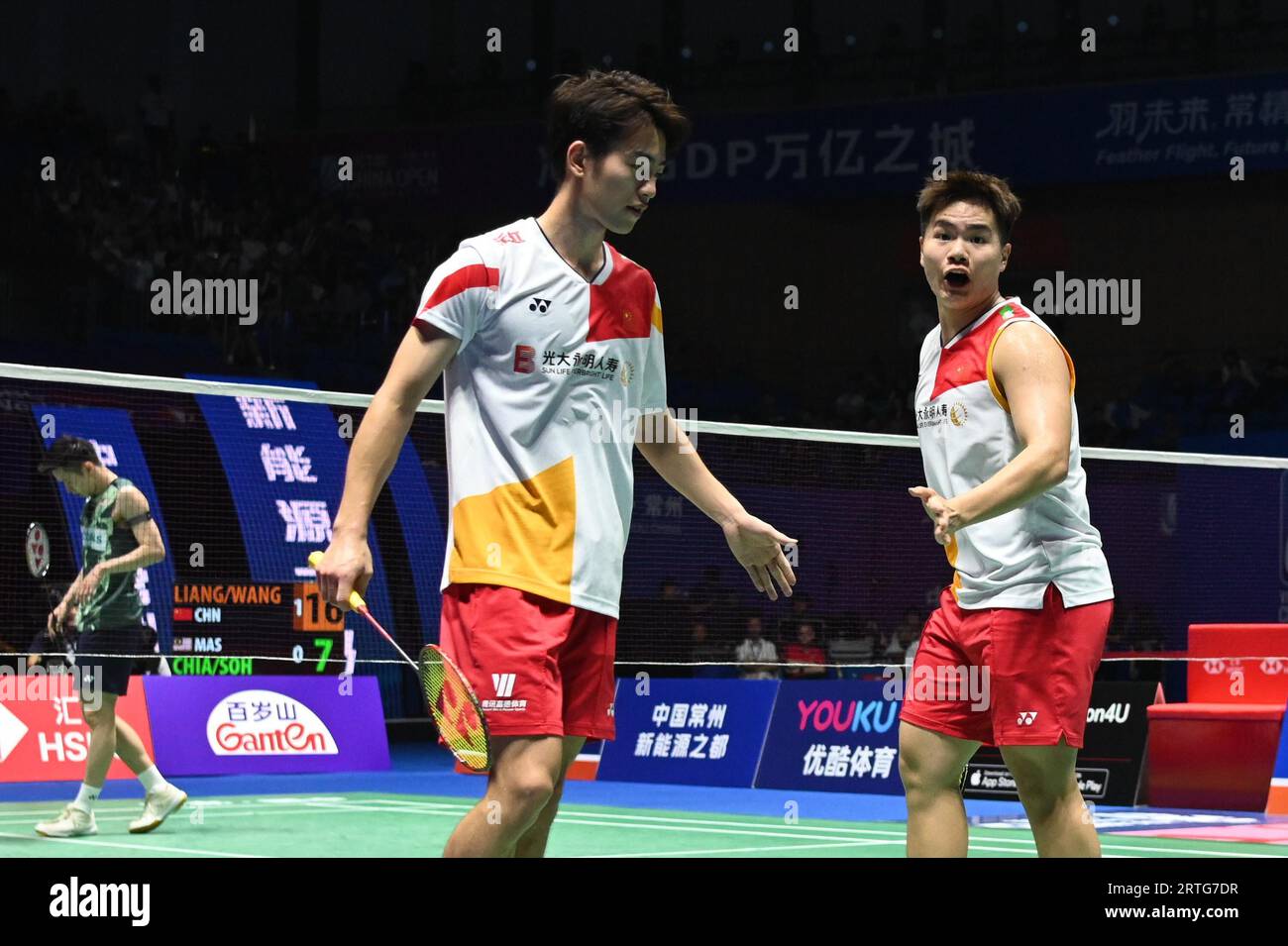 Chinese badminton players Liang Weikeng, Wang Chang defeat Malaysian ...