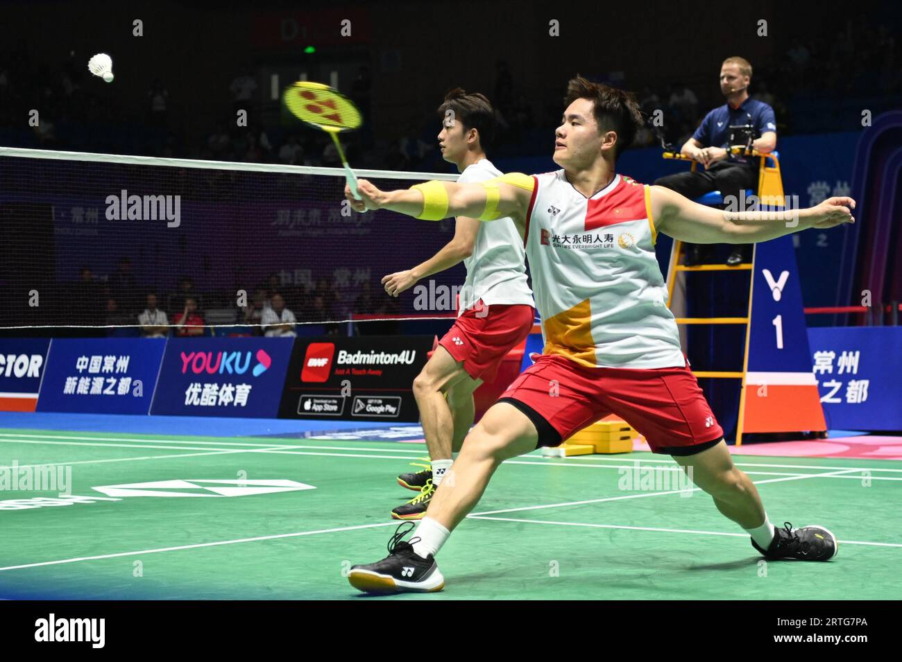 Chinese badminton players Liang Weikeng, Wang Chang defeat Malaysian ...