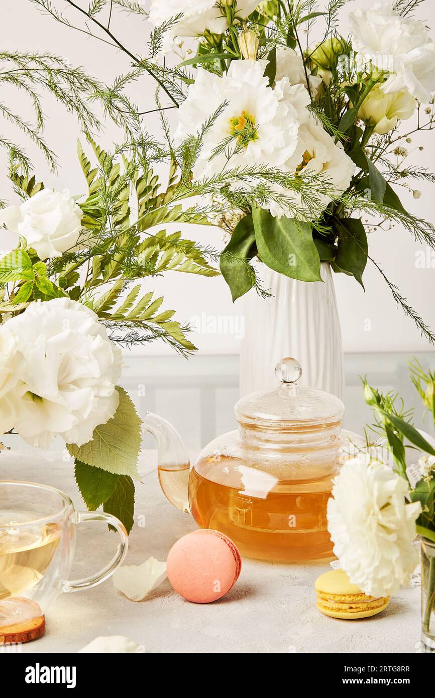 Aesthetic tea time, teapot, herbal tea and macaron desserts in ...