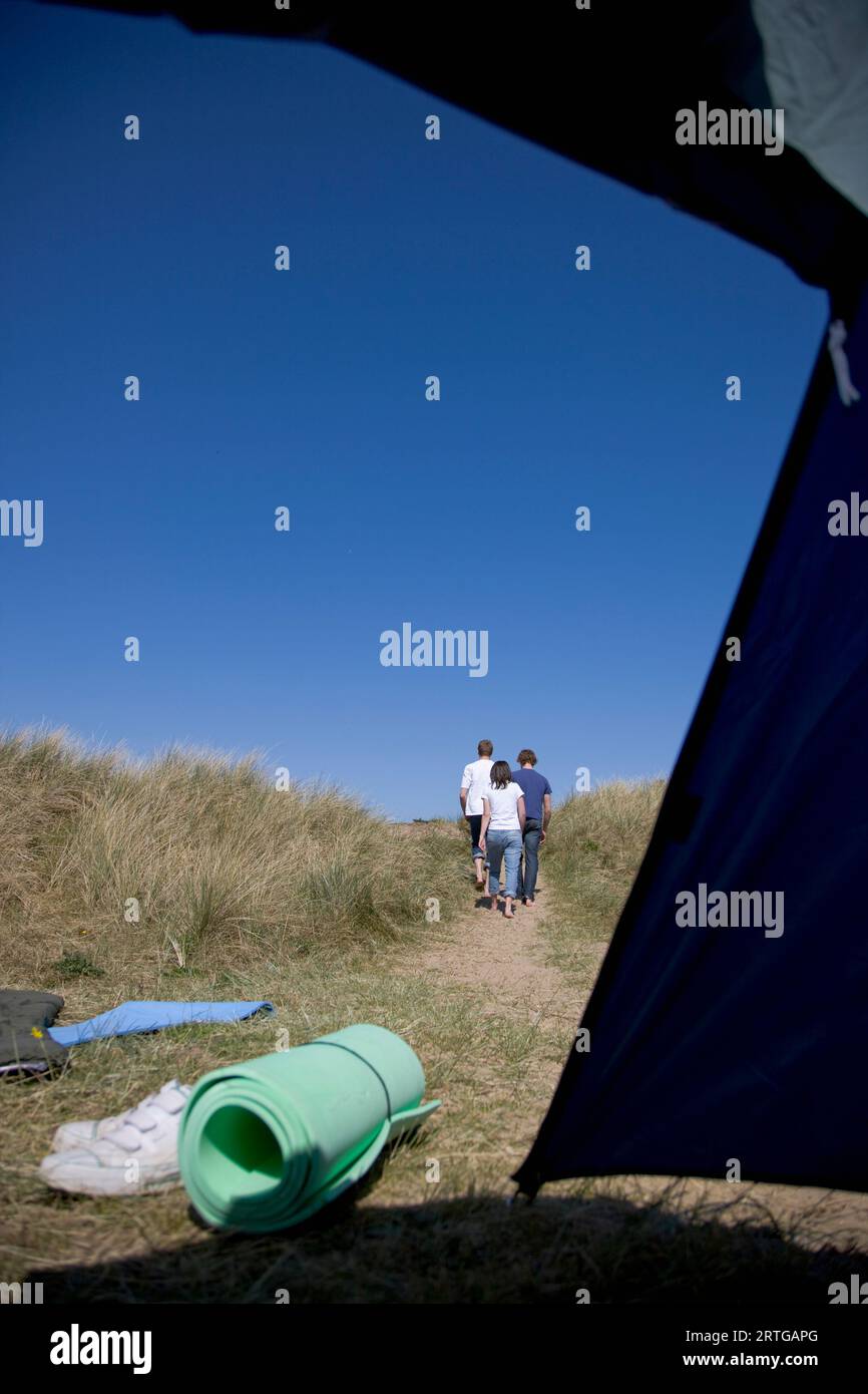 Three people back view hi-res stock photography and images - Alamy