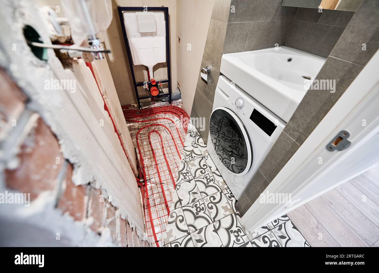 Comparison of washroom lavatory before and after renovation. Old ...