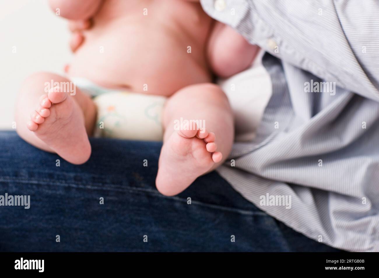 Sitting girl with boy on her lap hi-res stock photography and images ...