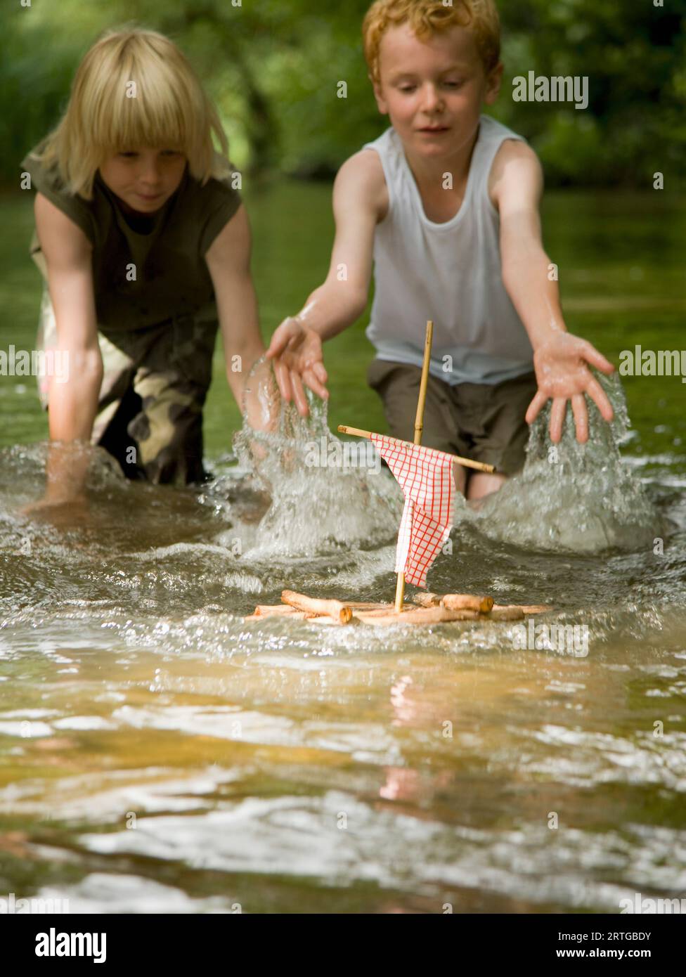 Child model boat hi-res stock photography and images - Alamy
