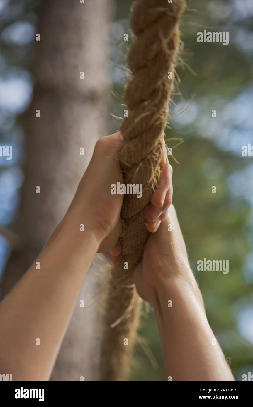 Dangling from rope hi-res stock photography and images - Alamy