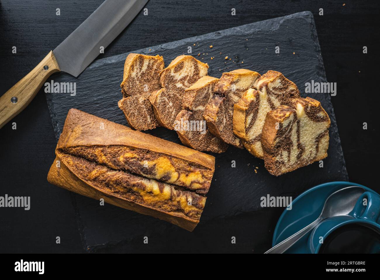 Marble sponge cake. Cake with cocoa and vanilla taste on the cutting ...
