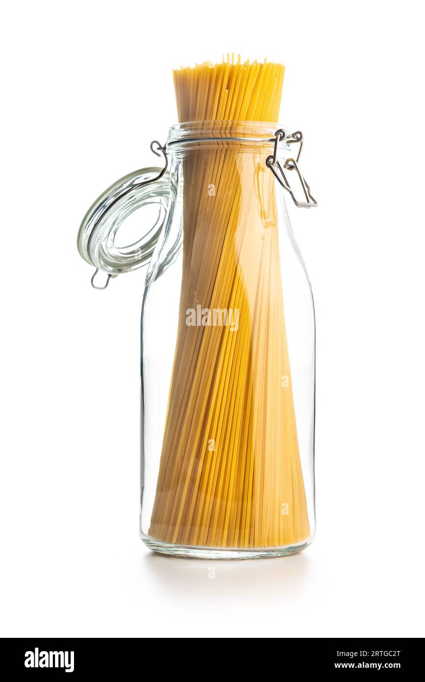Spaghetti pasta in glass bottle. Uncooked italian pasta isolated on the ...