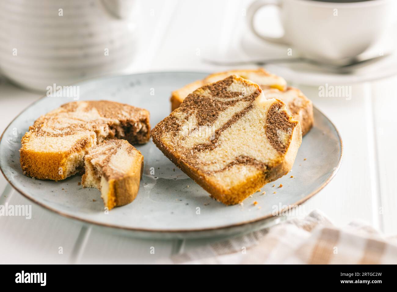 Marble sponge cake. Cake with cocoa and vanilla taste on the plate ...