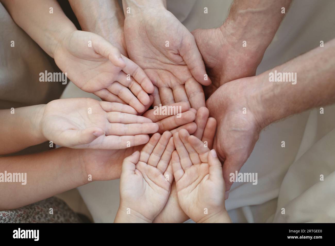 Human hands, many people holding empty space on hand together Stock ...