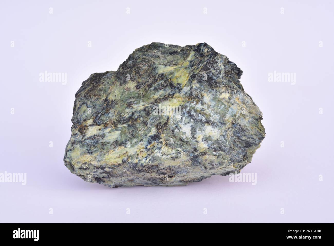 Serpentinite is a metamorphic rock formed by serpentinization of mafic ...