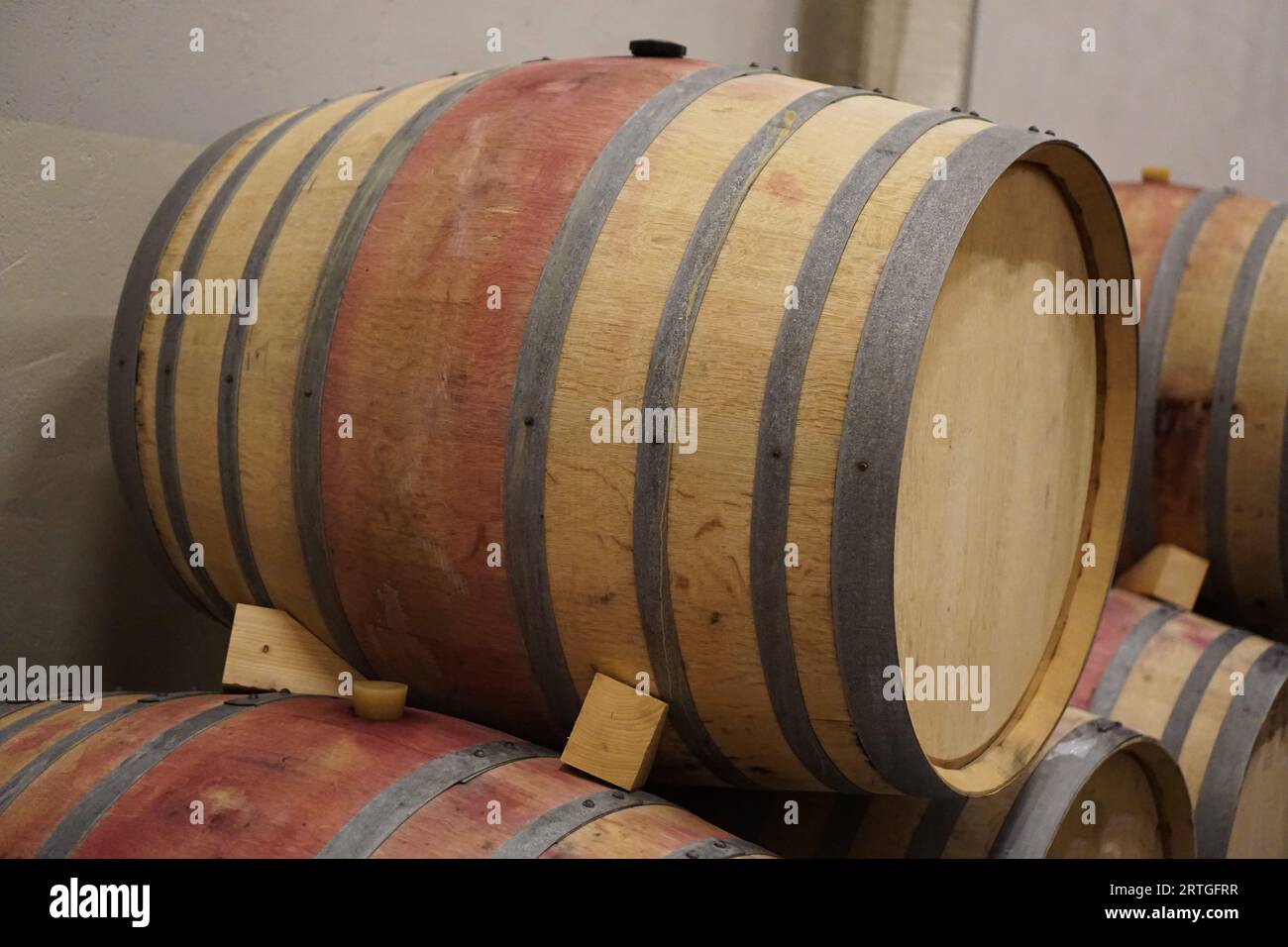 Nice oak wine barrels in a winery Stock Photo - Alamy