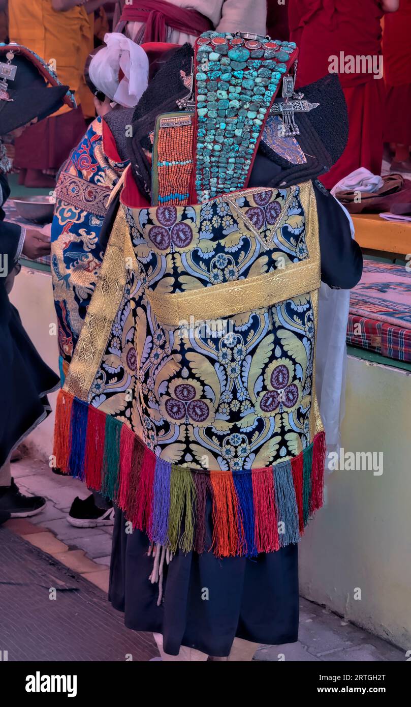 Ladakhi woman in traditional clothing at a high lama teaching, Lingshed ...