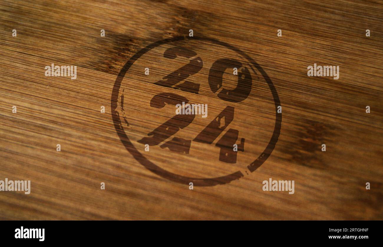 2024 year stamp printed on wooden box concept Stock Photo - Alamy