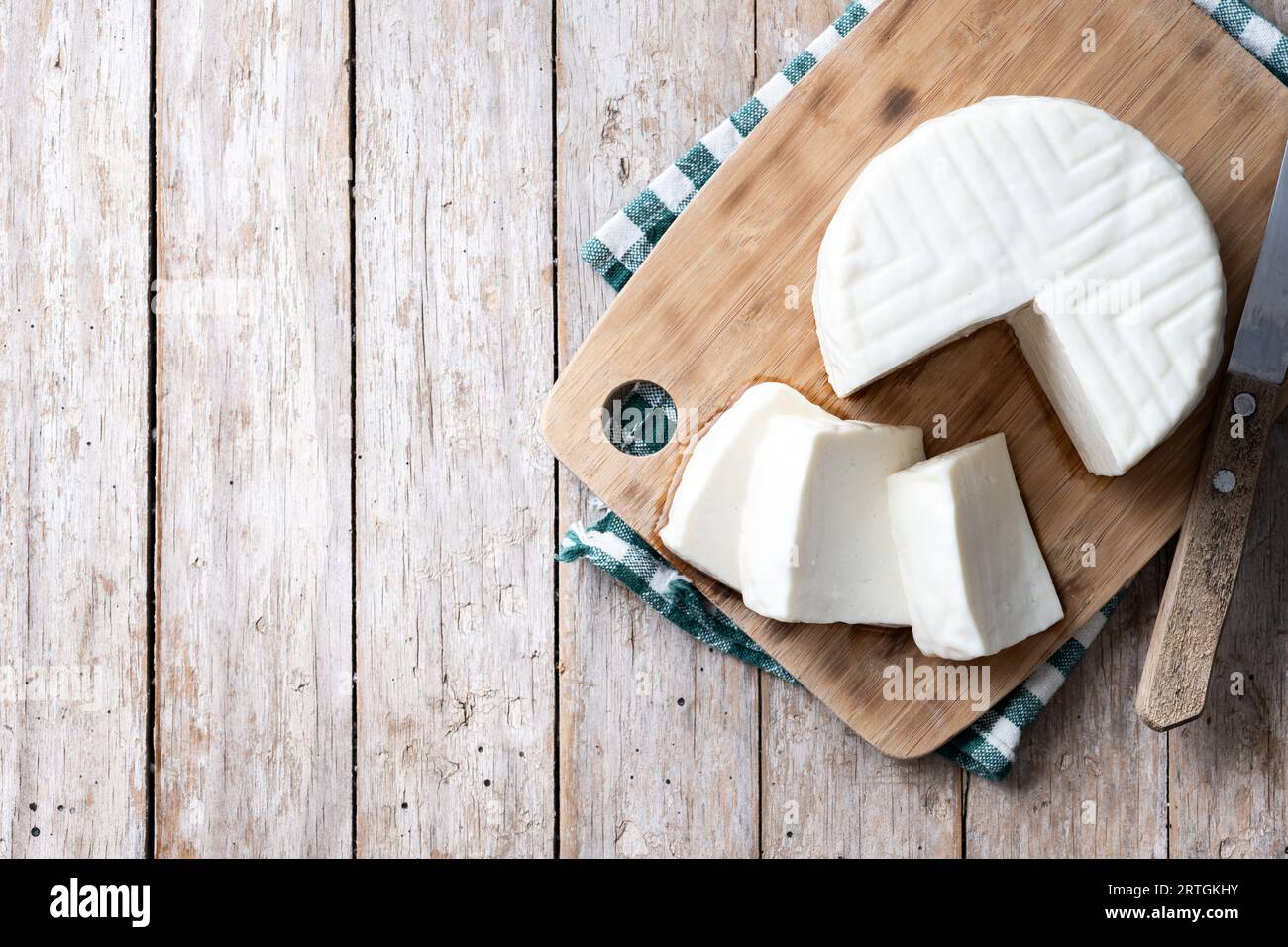 Sliced fresh white cheese from cow's milk on white background Stock ...