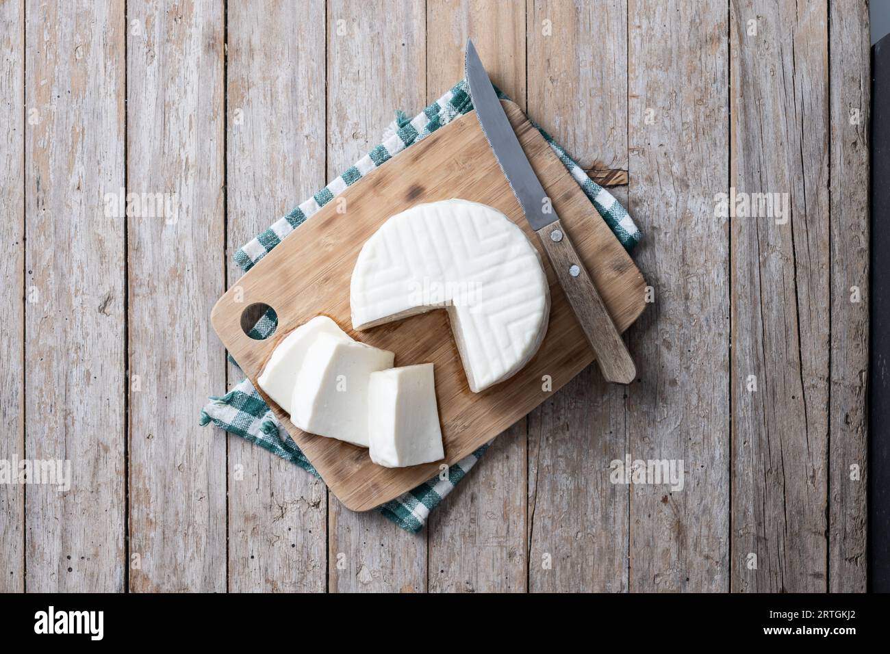 Sliced fresh white cheese from cow's milk on white background Stock ...