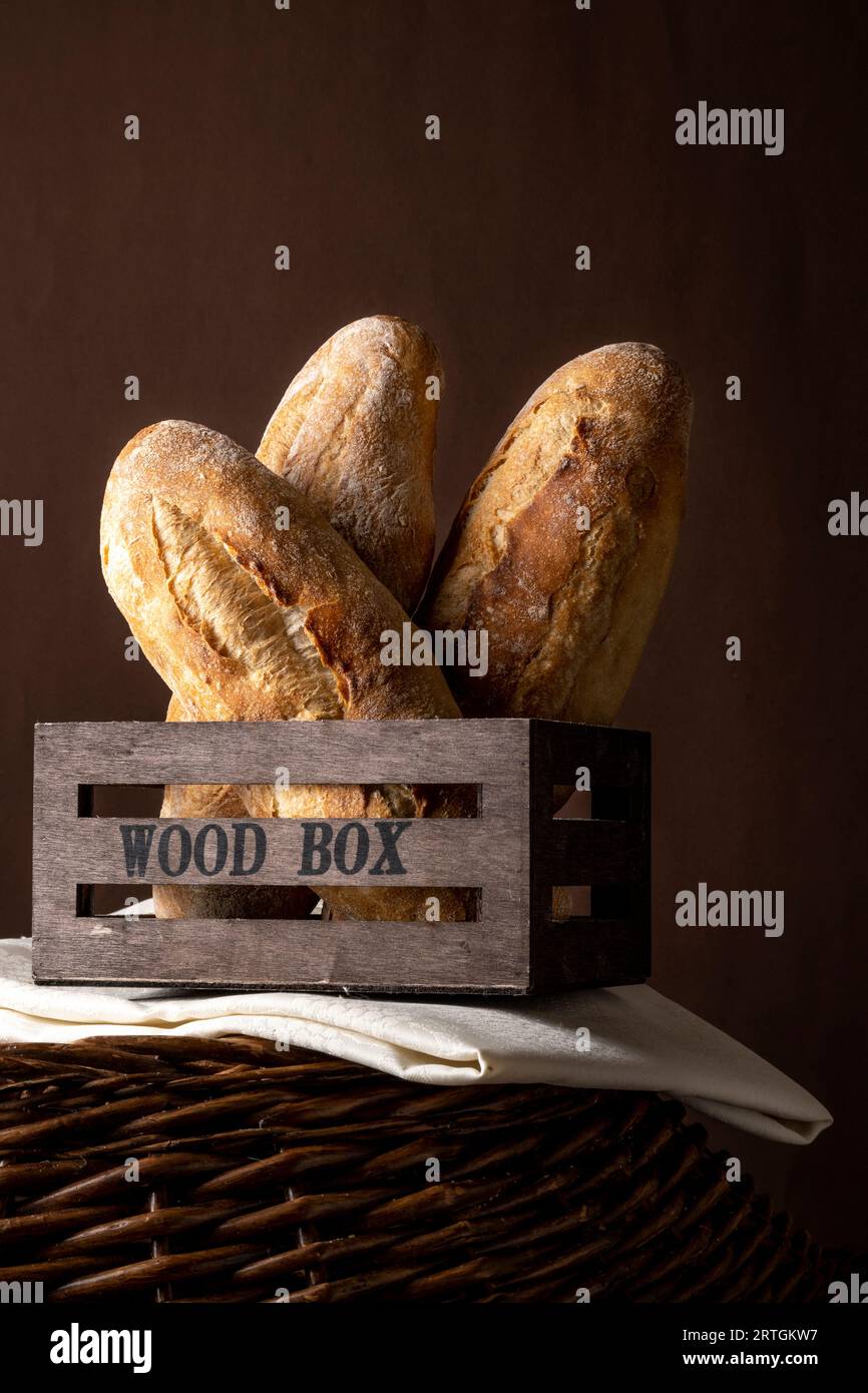 Artisan baguette bread, baking goods in rustic style Stock Photo - Alamy