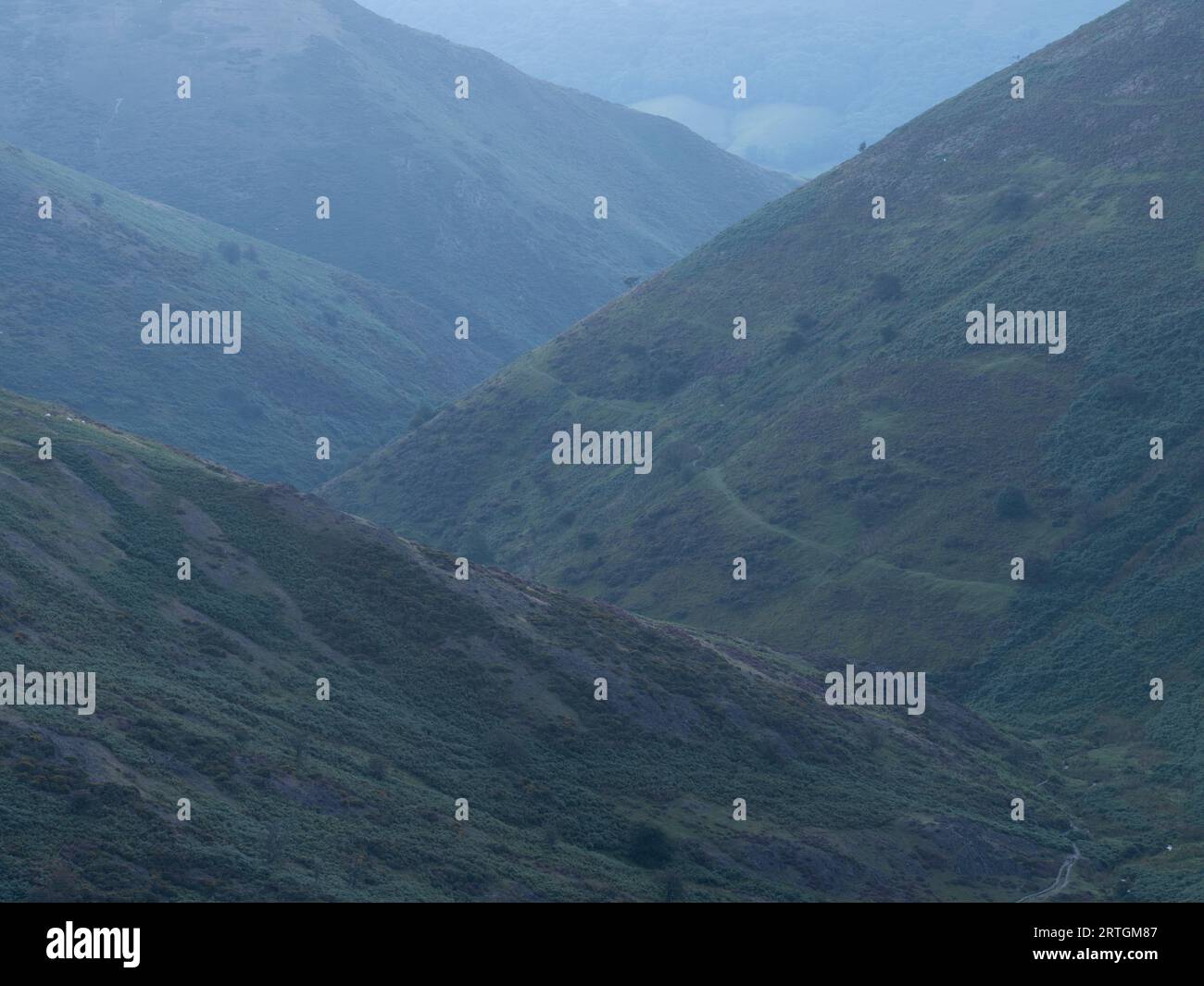Ashes Hollow, one of the deep valleys cutting into The Long Mynd, an ...