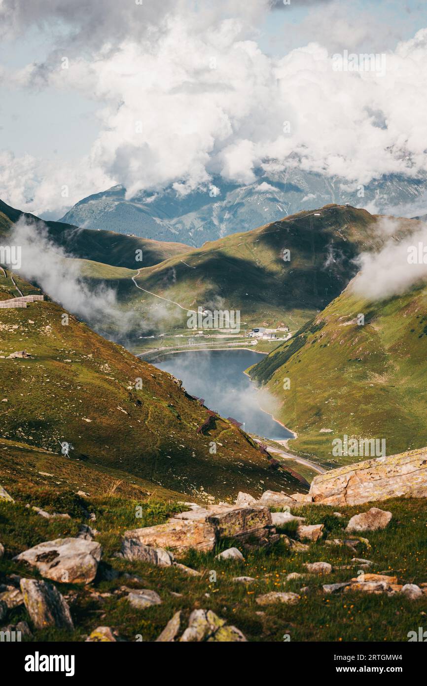 A scenic view of a tranquil lake nestled in the stunning backdrop of ...