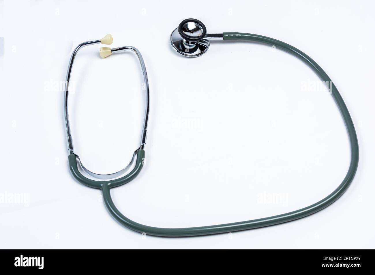 Stethoscope photographed in studio on a plain white background with ...