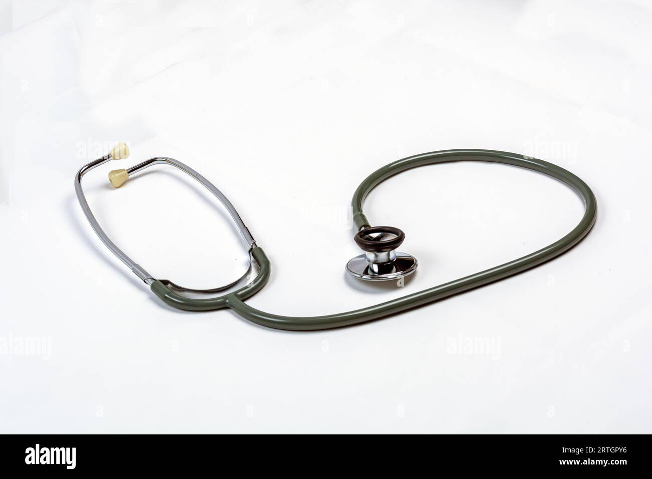 Stethoscope photographed in studio on a plain white background with ...