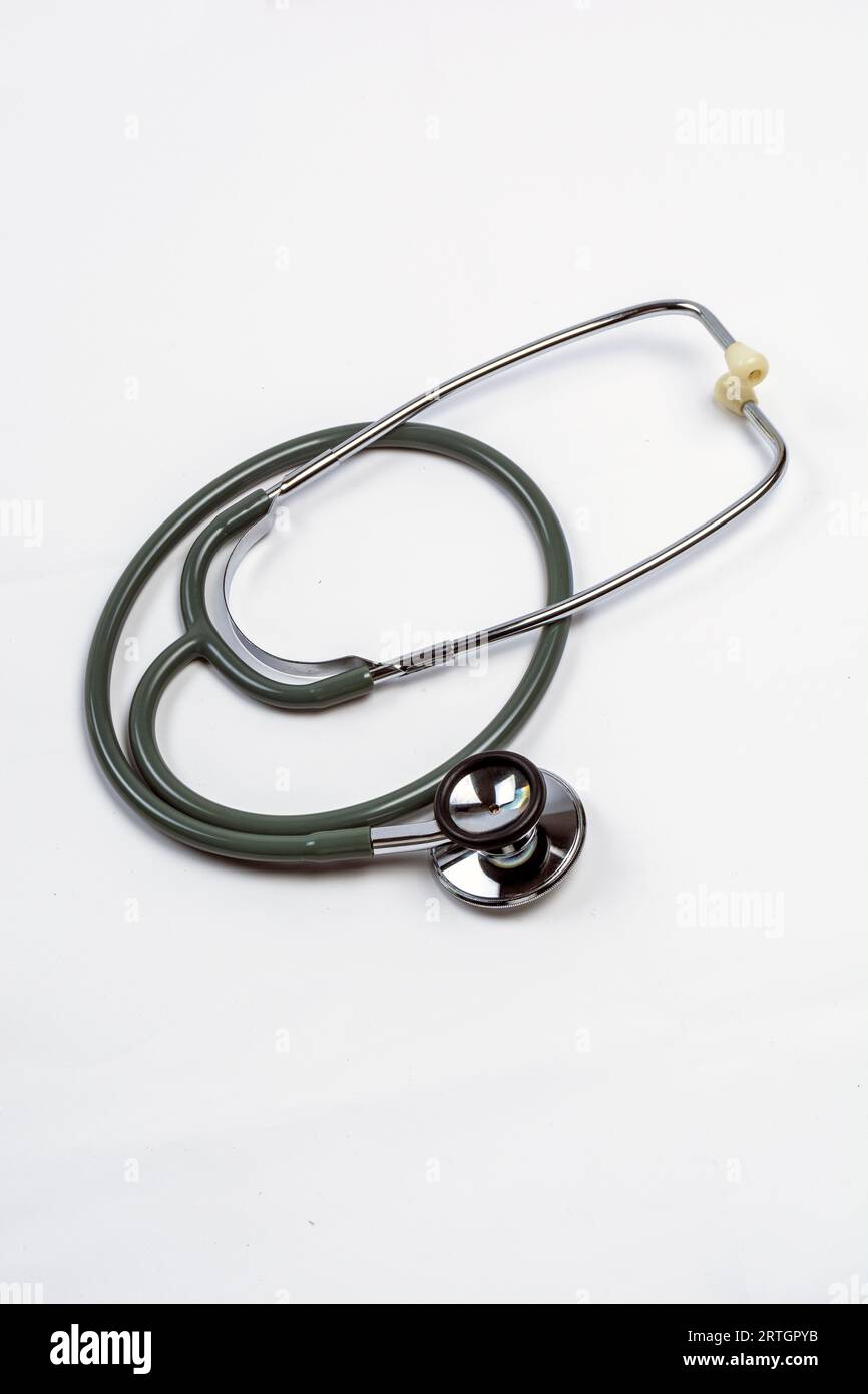 Stethoscope photographed in studio on a plain white background with ...