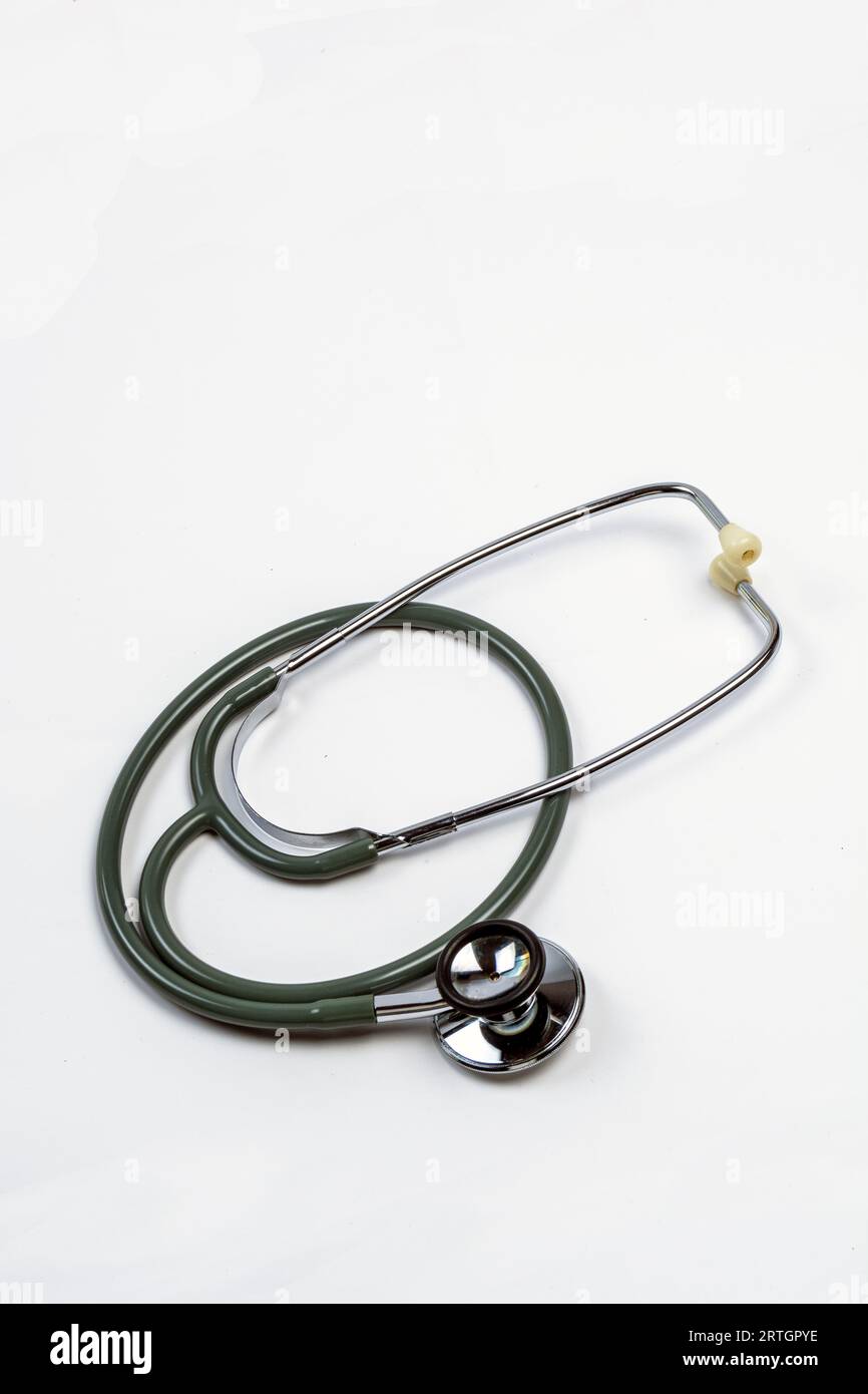Stethoscope photographed in studio on a plain white background with ...