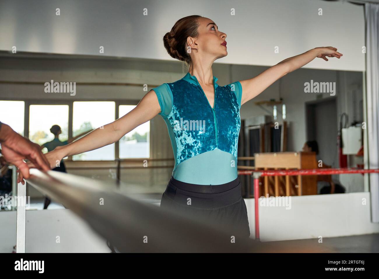 Ballet dancer warming up and dancing at a dance academy Stock Photo - Alamy
