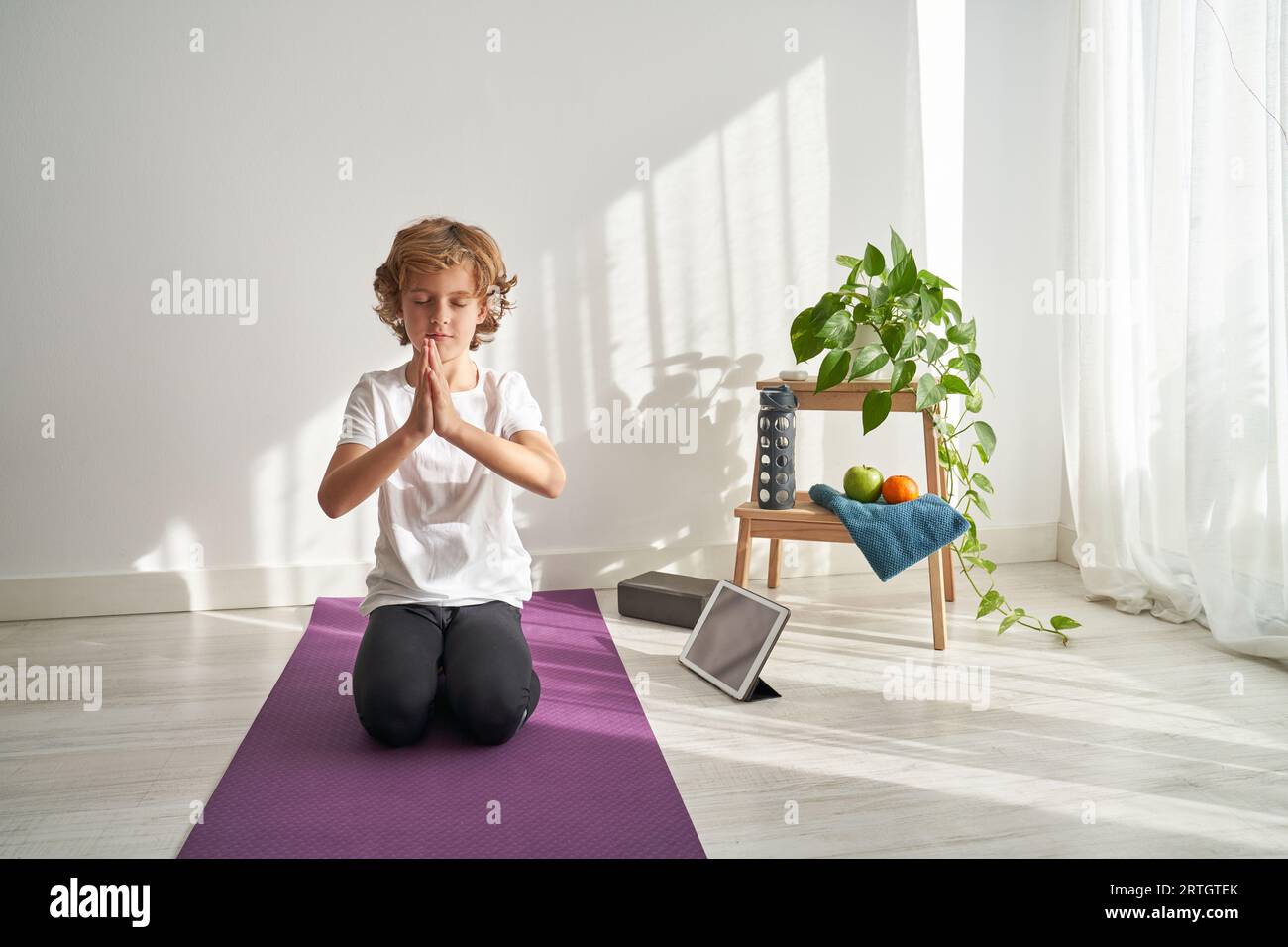 Boy home yoga hi-res stock photography and images - Alamy