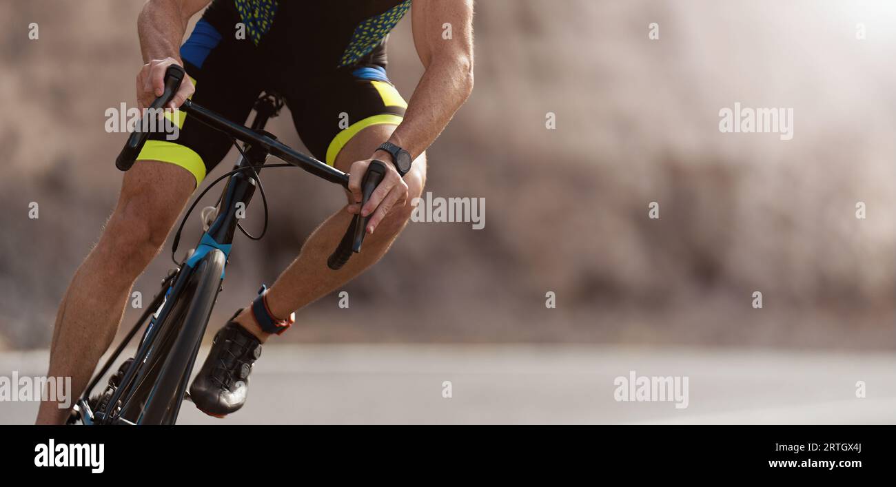 Road bike cyclist man cycling, athlete on a race cycle Stock Photo - Alamy