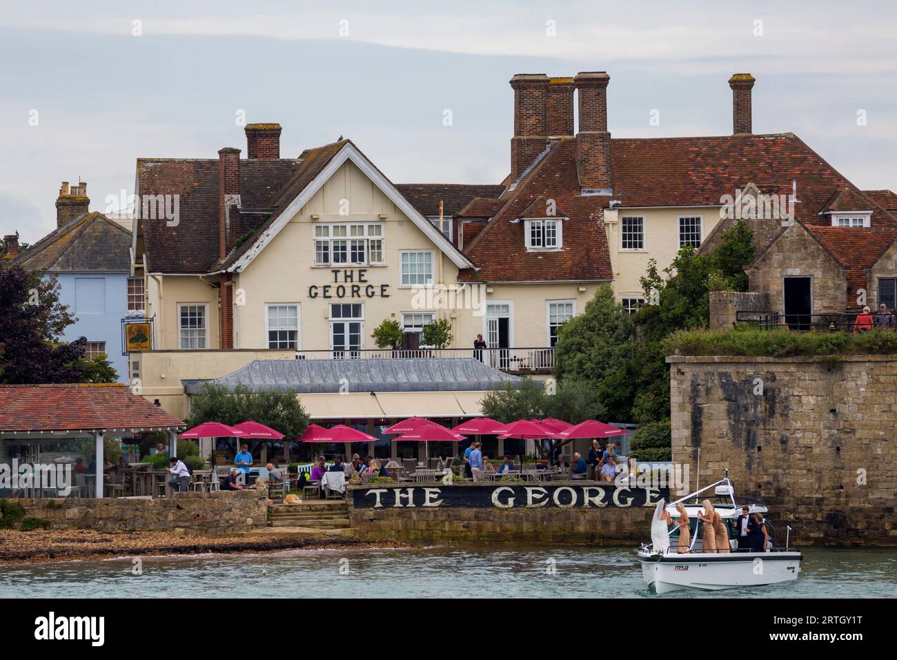 Wedding party on Mr.B Axopar Brabus boat outside the George Hotel at ...