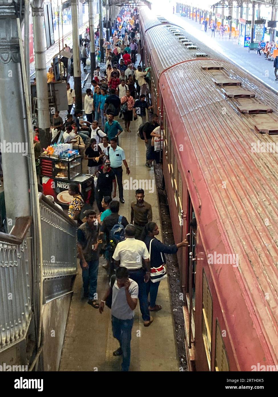 Commuters wait on a platform at the Fort railway station during a trade ...