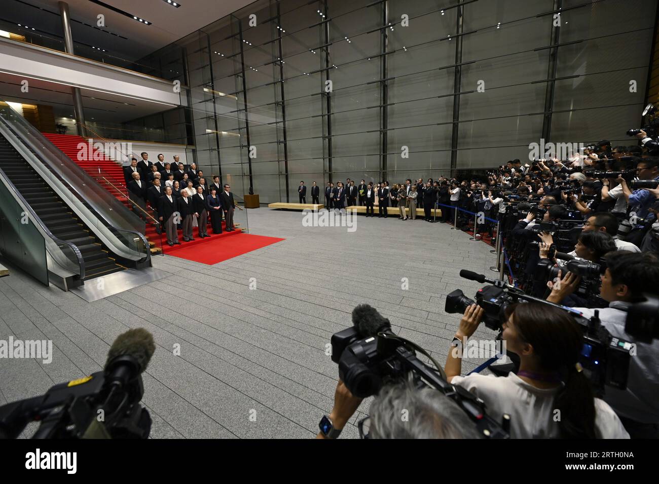 Japanese Prime Minister Fumio Kishida poses with his new cabinet ...