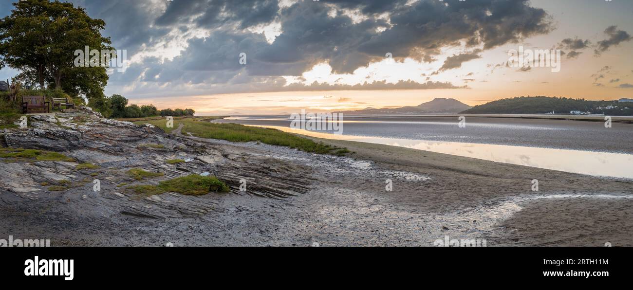 Sunset at Traeth Bach with blue sky and calm sea Stock Photo - Alamy