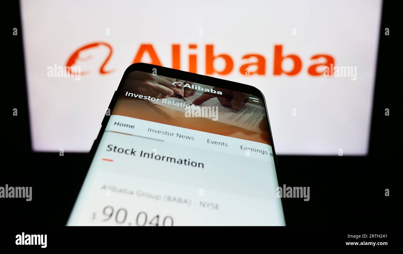 Mobile phone with webpage of Chinese company Alibaba Group Holding ...