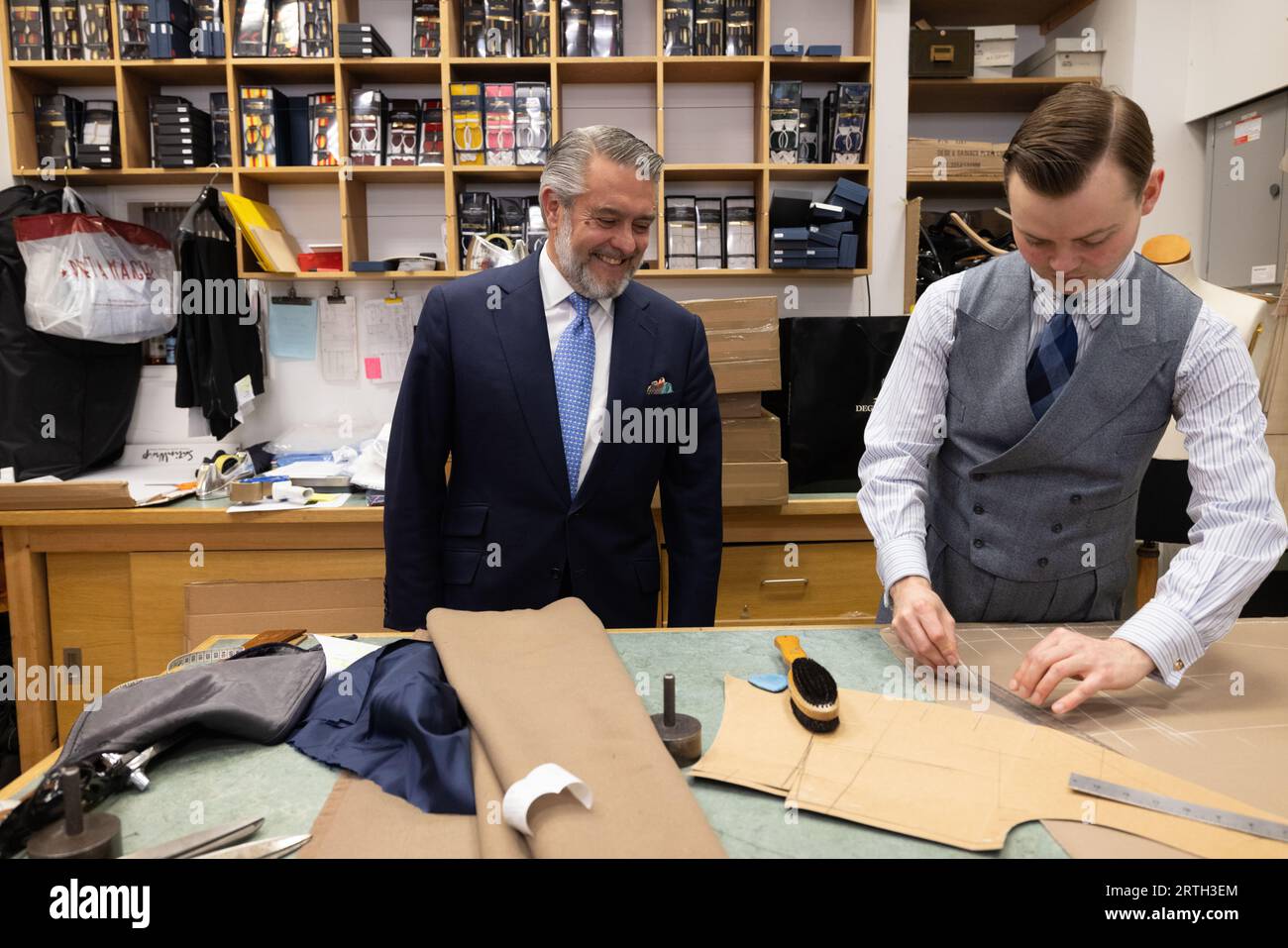 William Skinner, Managing Director with an apprentice at Dege & Skinner ...