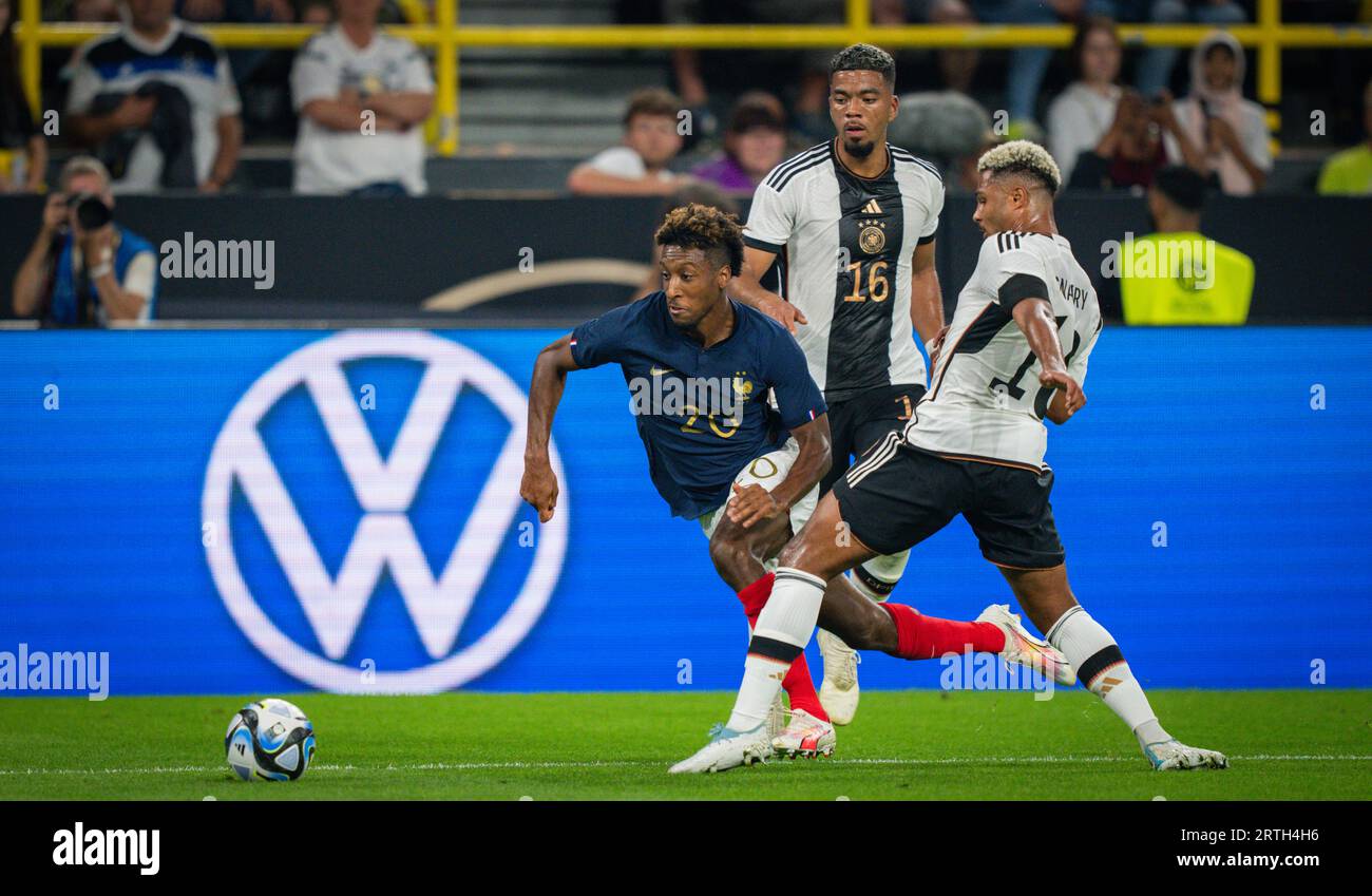 Dortmund, Germany. 12th Sep 2023. Kingsley Coman (FRA), Benjamin ...