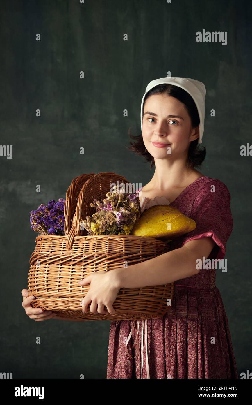 Countryside aesthetics. Elegant young woman, medieval maid standing ...