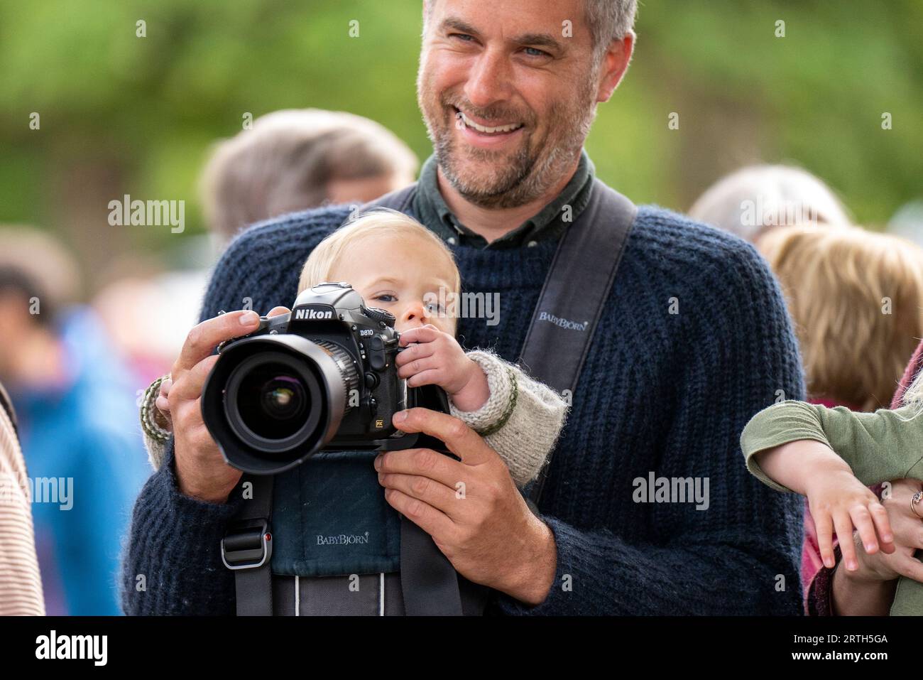 Ian Barnes, from Tomnavulin, waits with his 14-month-old daughter Molly ...