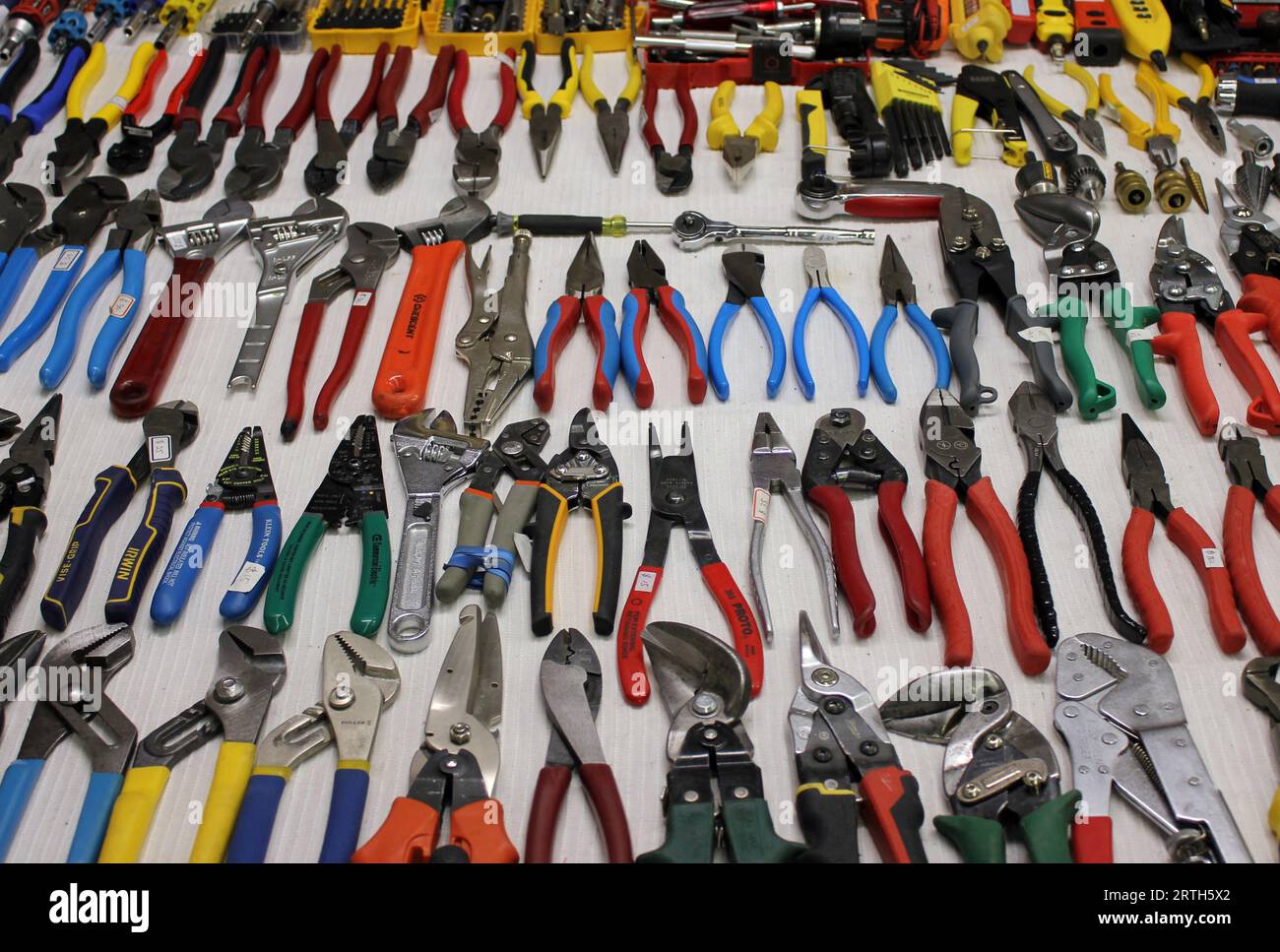 A collection of variously-sized tools arranged in a row Stock Photo - Alamy