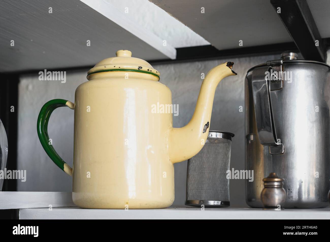 vintage metallic teapot on kitchen shelf Stock Photo - Alamy